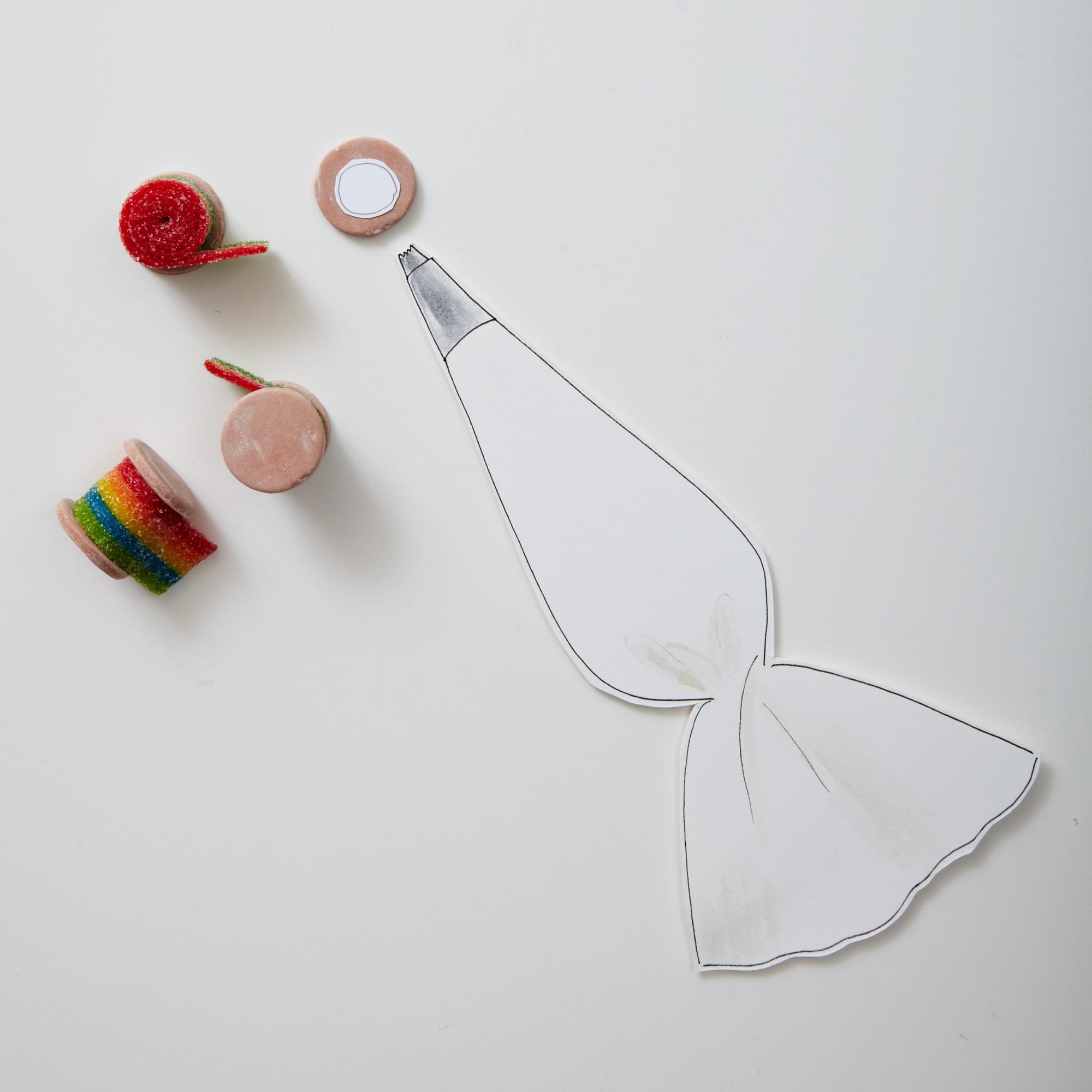 Step 2 Attach chocolate Necco wafers to top and bottom of spool with ...